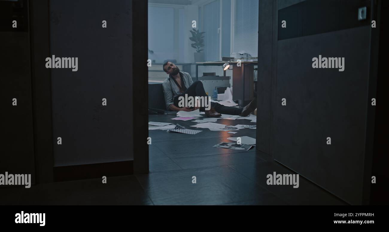 Night office angry businessman sit hi-res stock photography and images ...