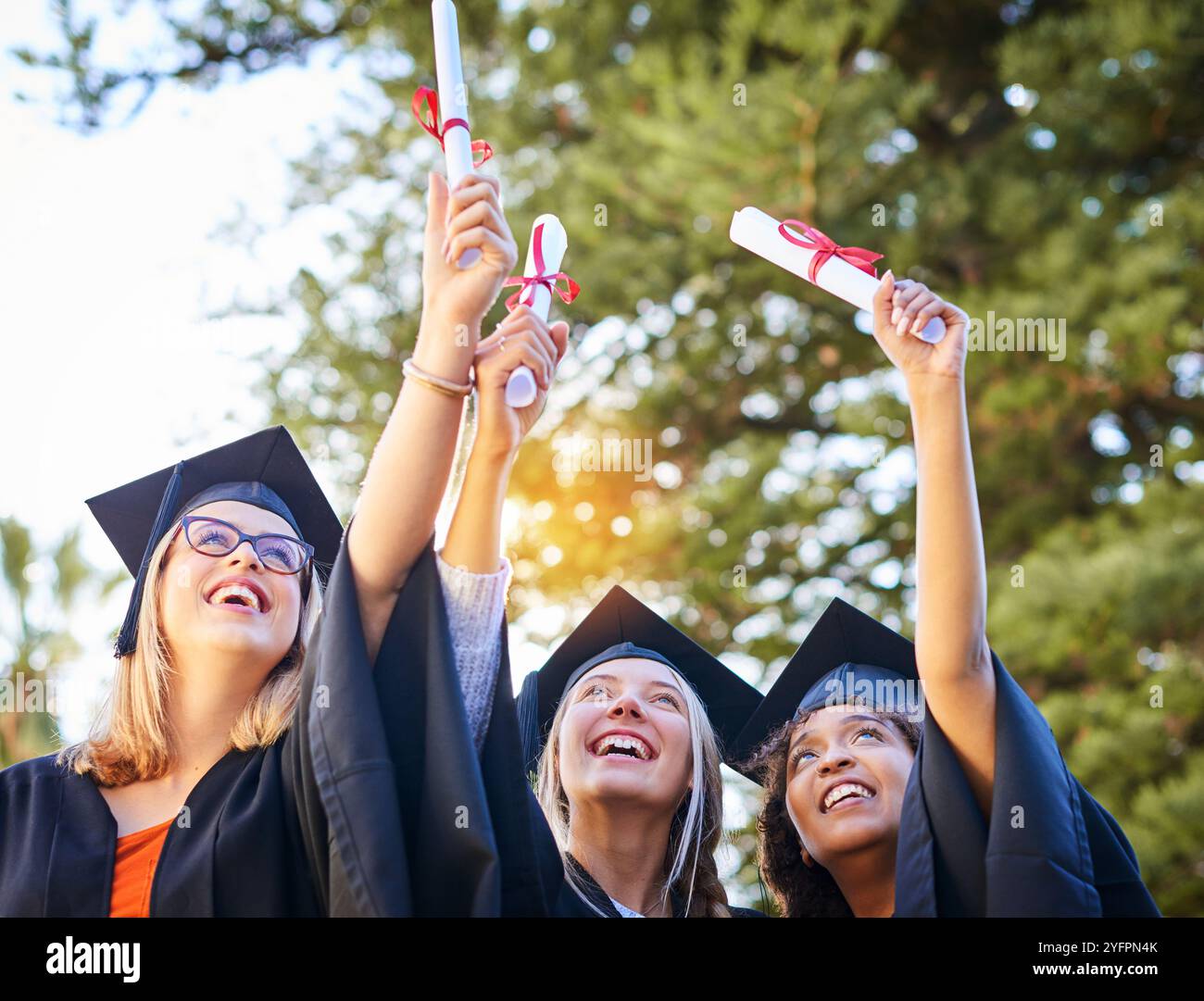 Happy women, graduation and friends with certificate in air for ...