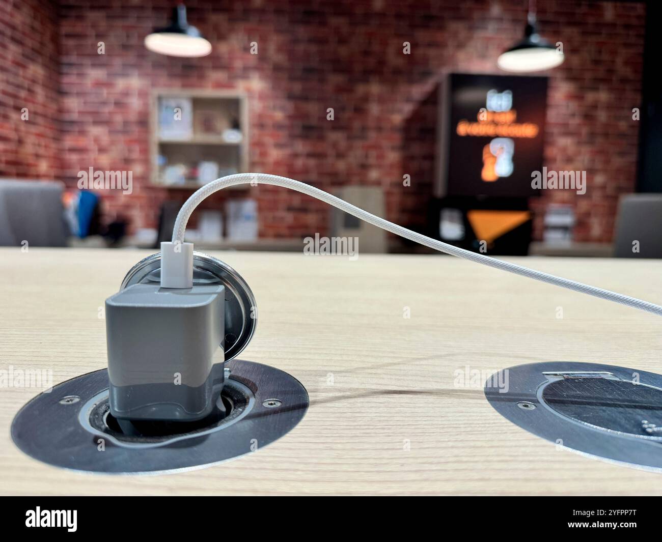 A plug and USB plugged into an electricity socket. France Stock Photo ...