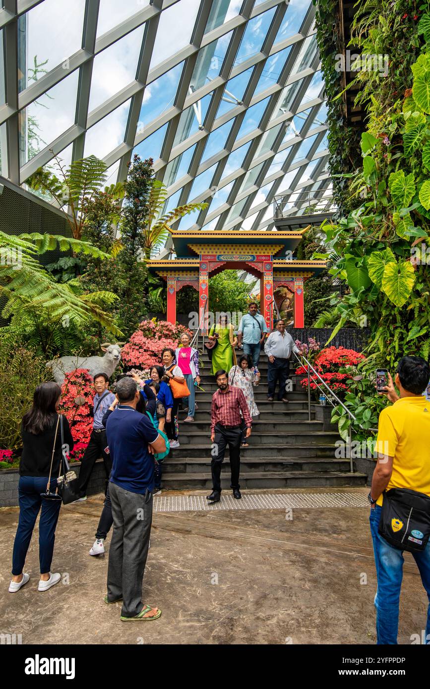 People enjoying the interior view of the gardens and part of the glass ...