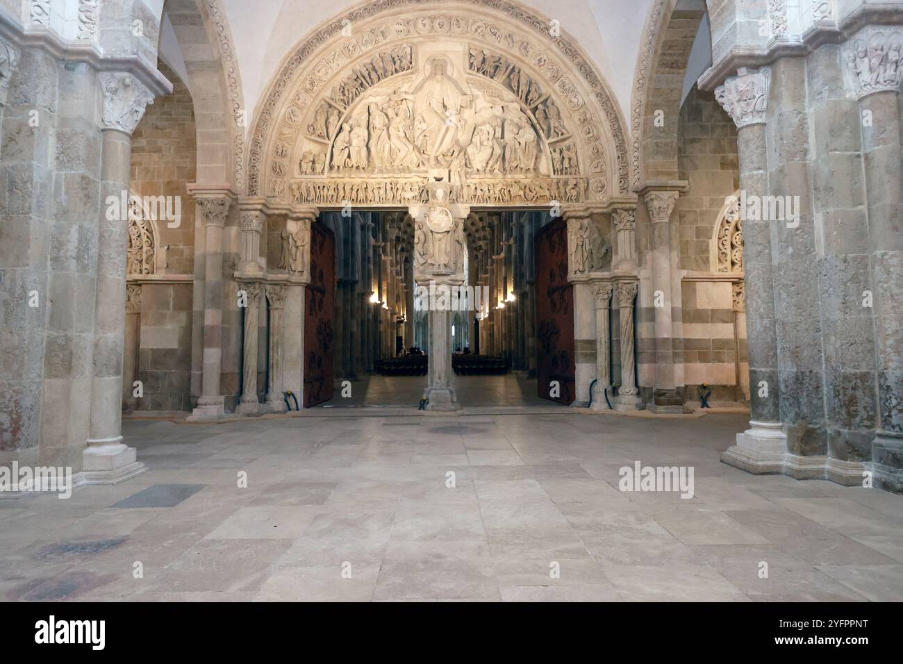 Benedictine abbey of Vezelay. Tympanum of the Narthex representing ...