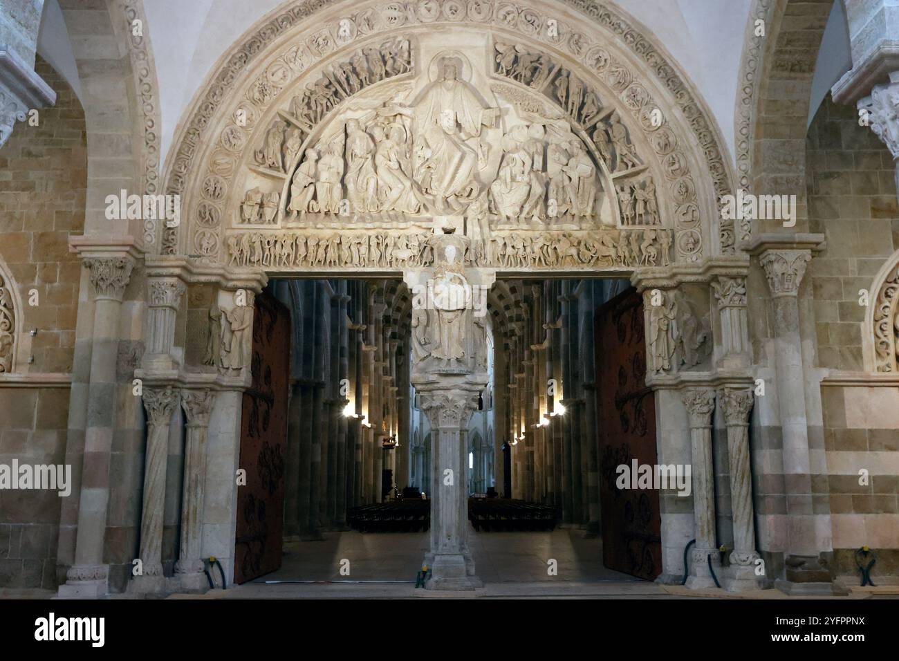 Benedictine abbey of Vezelay. Tympanum of the Narthex representing ...