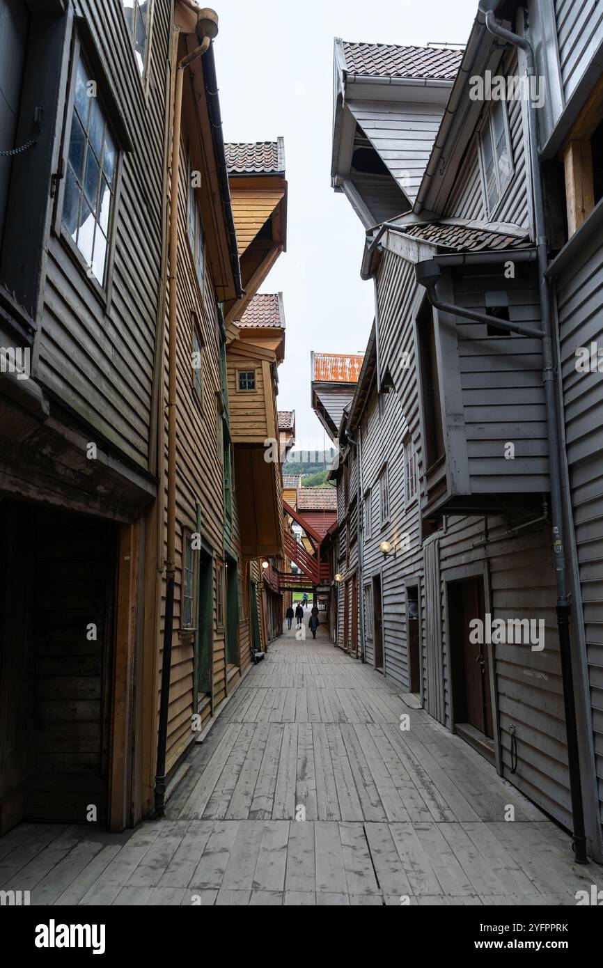 Bergen, Norway - August 8, 2022: Narrow alleyway between the iconic ...