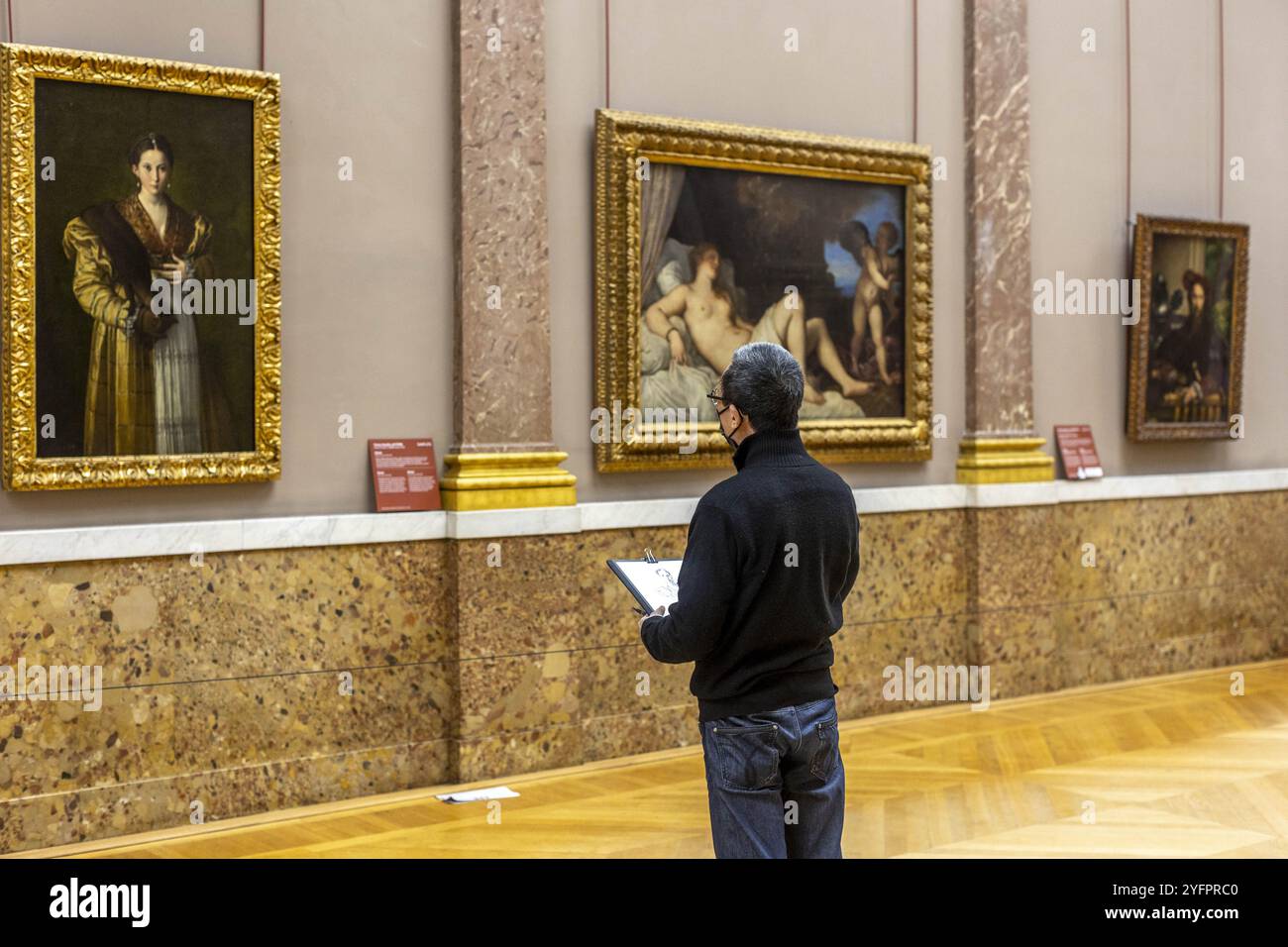 Man drawing a copy of a painting in the Louvre museum, Paris, France ...