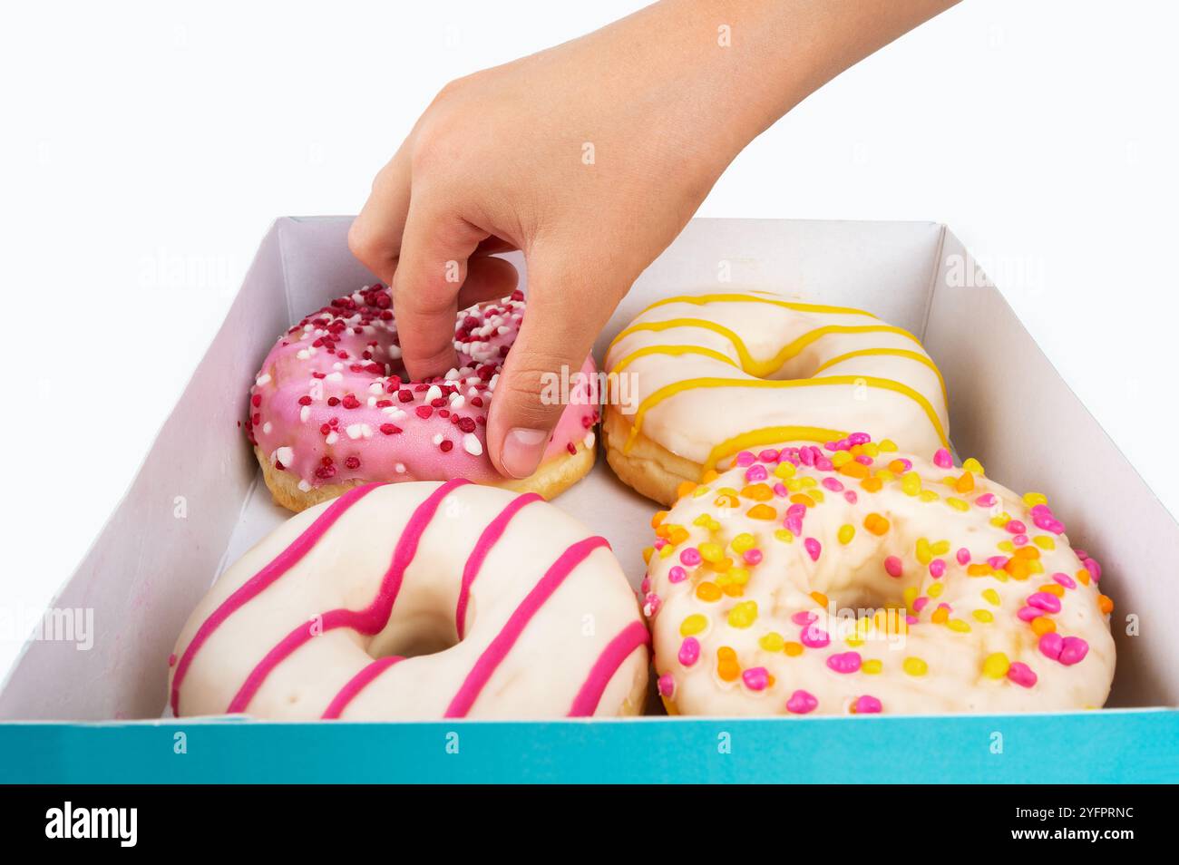 Boy reaching chocolate cake hi-res stock photography and images - Alamy