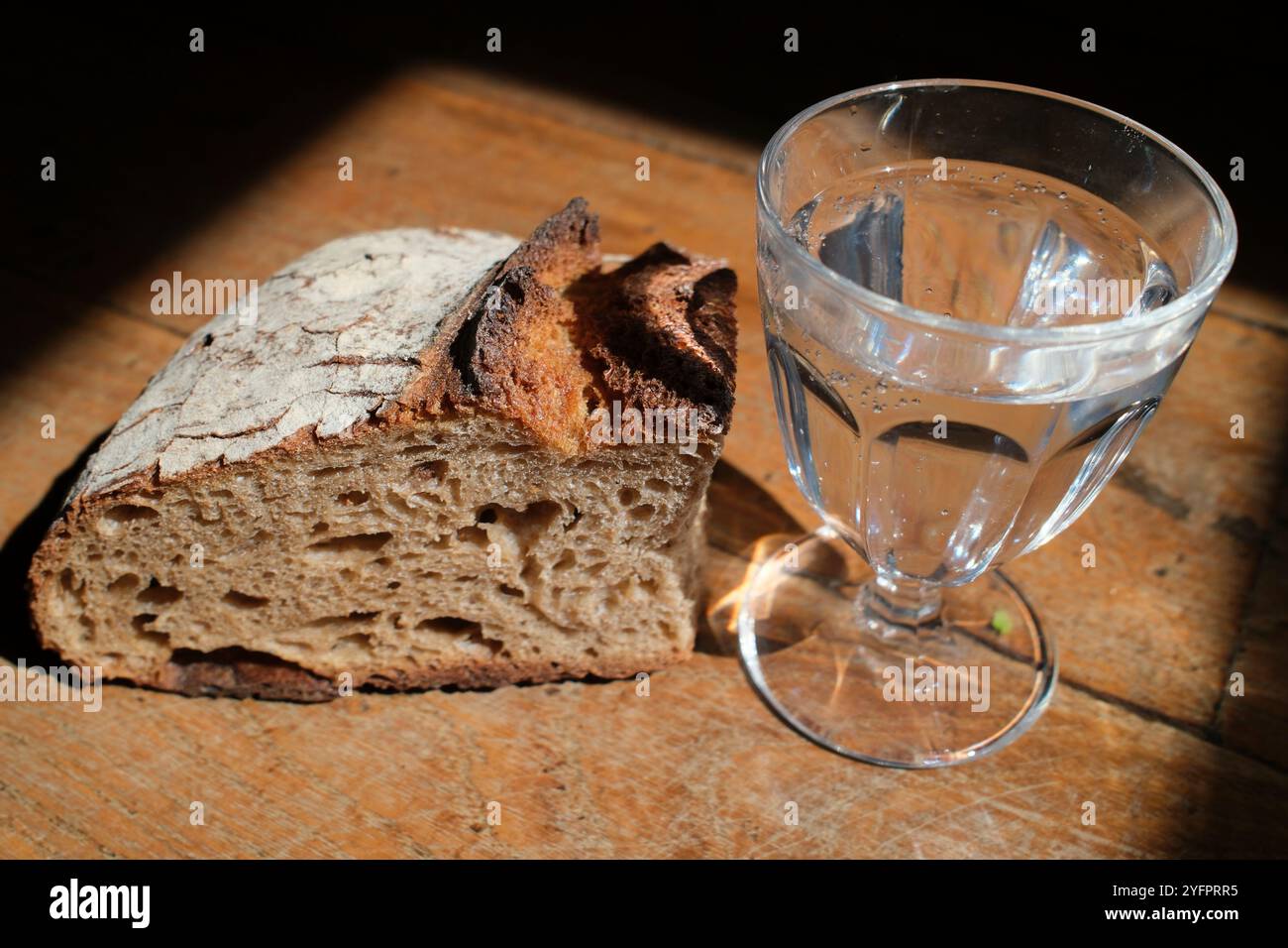 Bread and glass of water during Lent. A solemn religious observance ...
