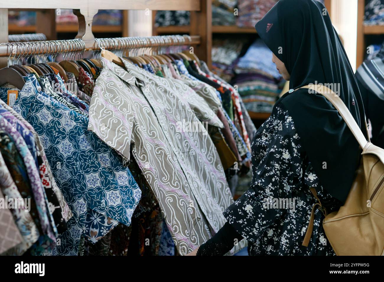 Batik Production. Batik is Indonesian traditional clothing. Shirts on ...