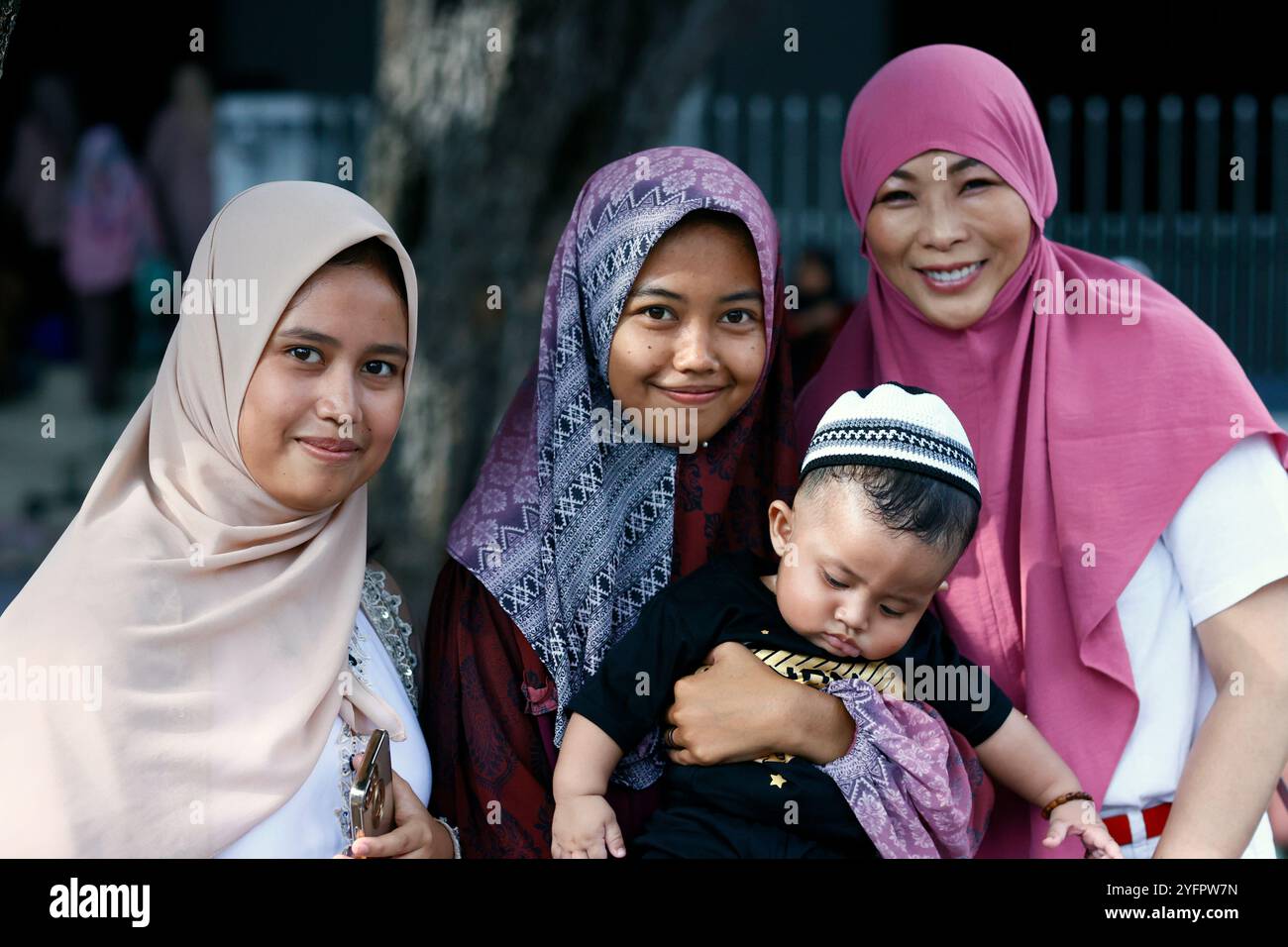 Indonesian women wearing the traditional Islamic hijab veil. Indonesia ...