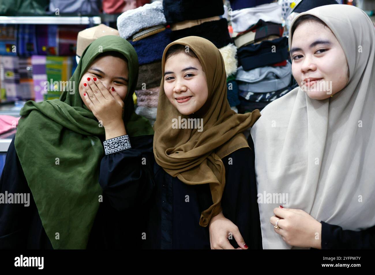 Indonesian women wearing the traditional Islamic hijab veil. Indonesia ...