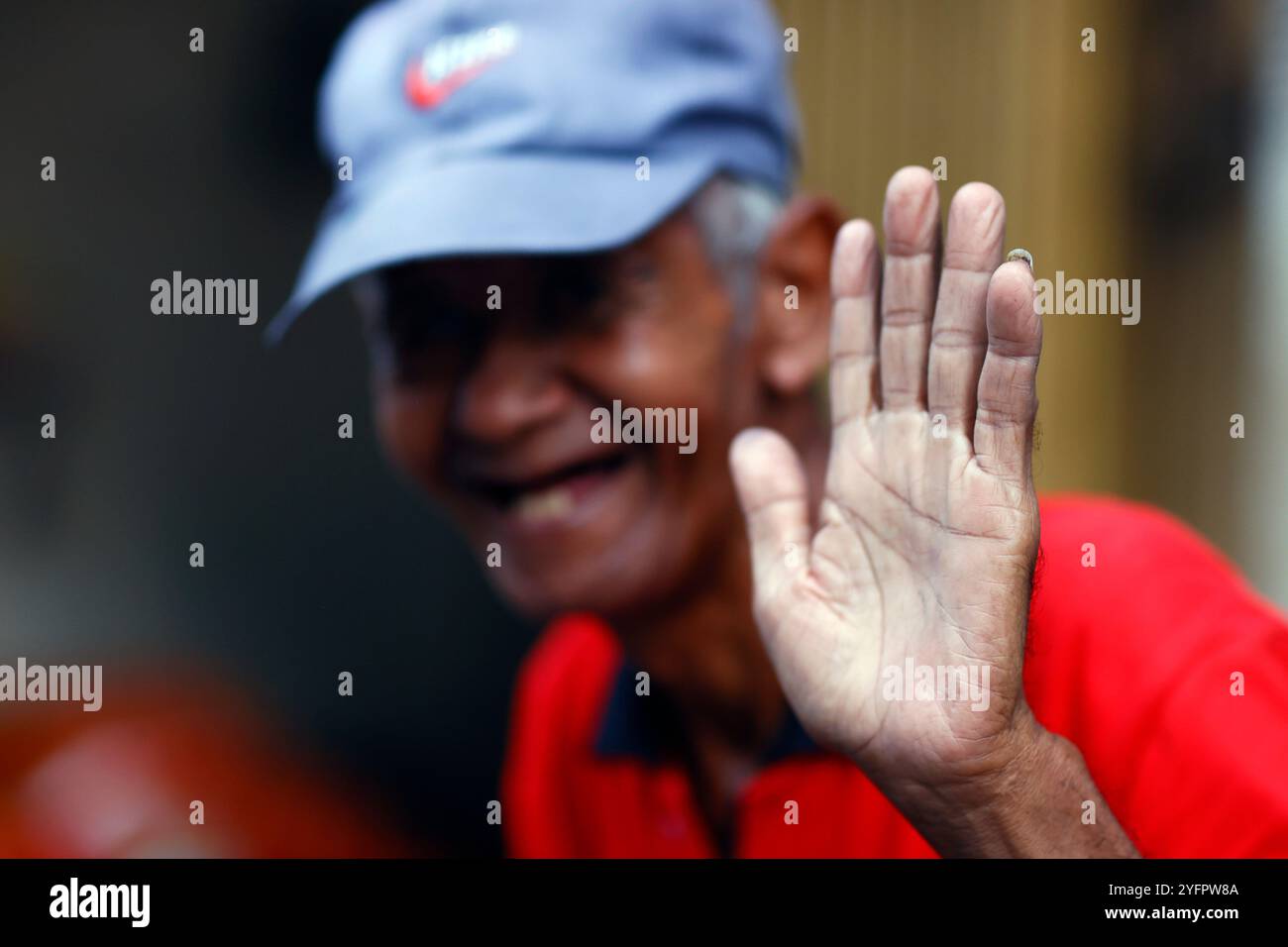 Old indonesian man with a blue cap. Portrait. Surabaya. Indonesia Stock ...
