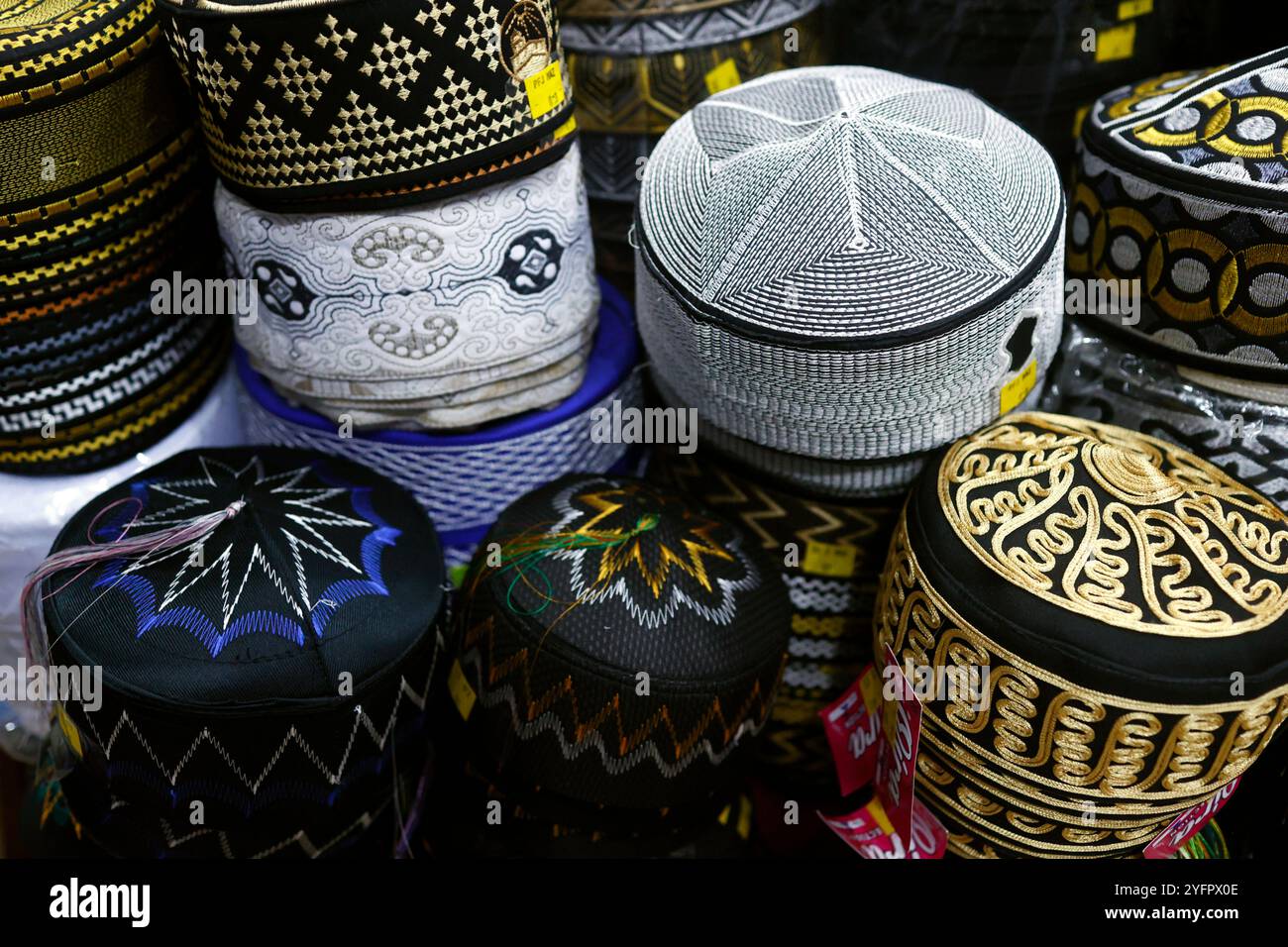 Kufi muslim headwear for men in a market. Ampel Arab Quarter. Surabaya ...