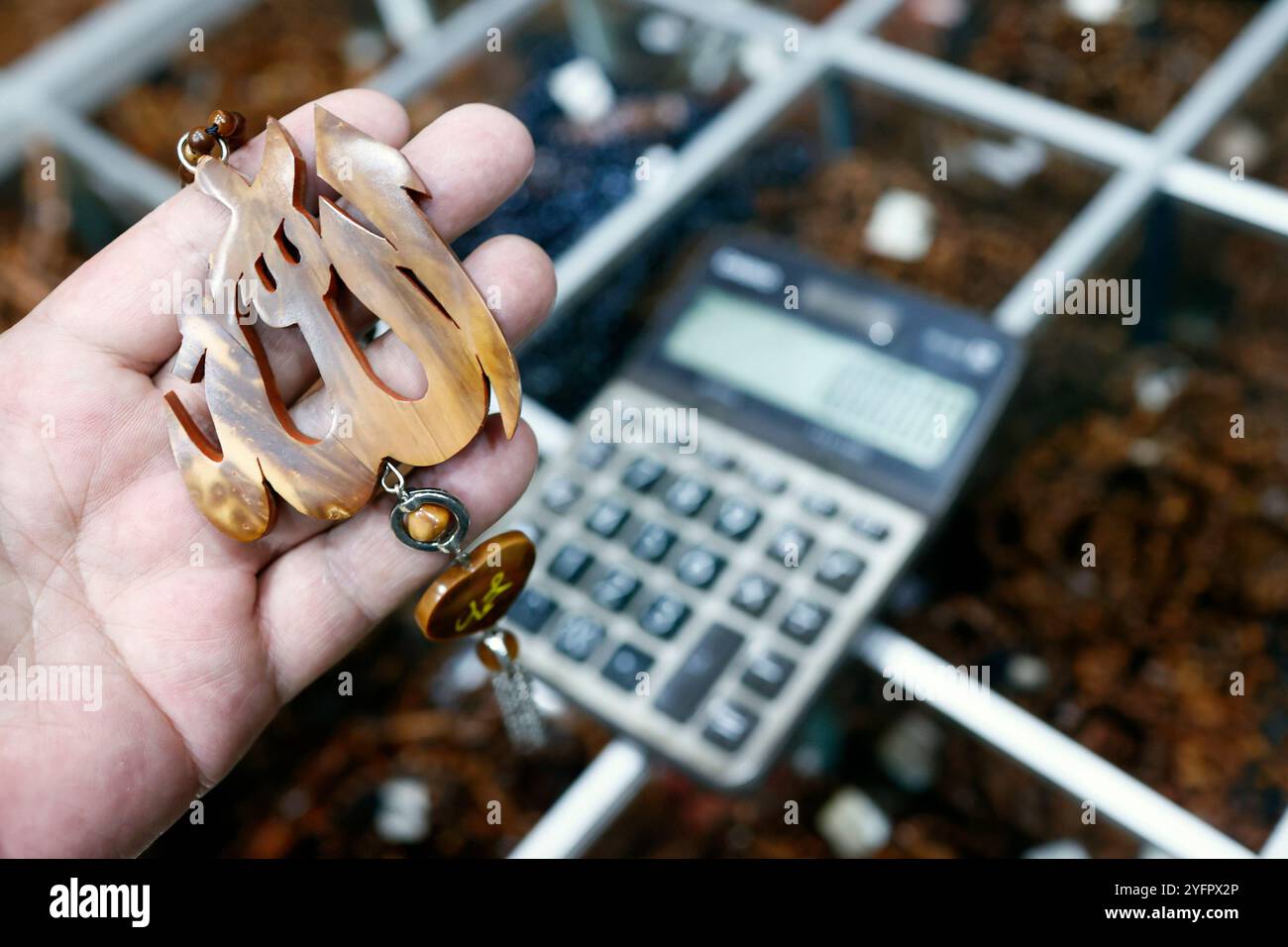 Allah monogram for sale in market. Ampel Arab Quarter. Surabaya ...