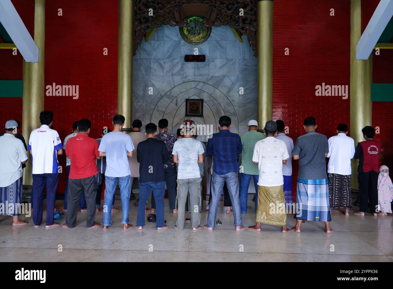 Muhammad Cheng Hoo Mosque. Muslim men praying and worship. Surabaya ...