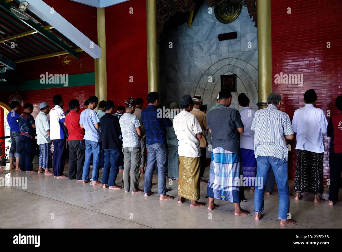 Muhammad Cheng Hoo Mosque. Muslim men praying and worship. Surabaya ...