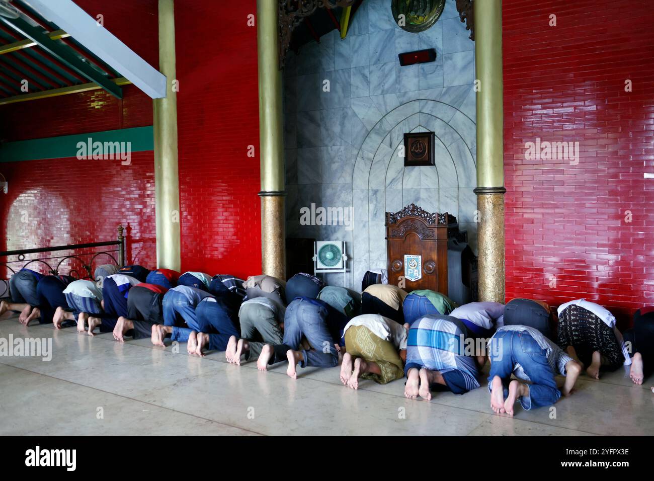 Muhammad Cheng Hoo Mosque. Muslim men praying and worship. Surabaya ...