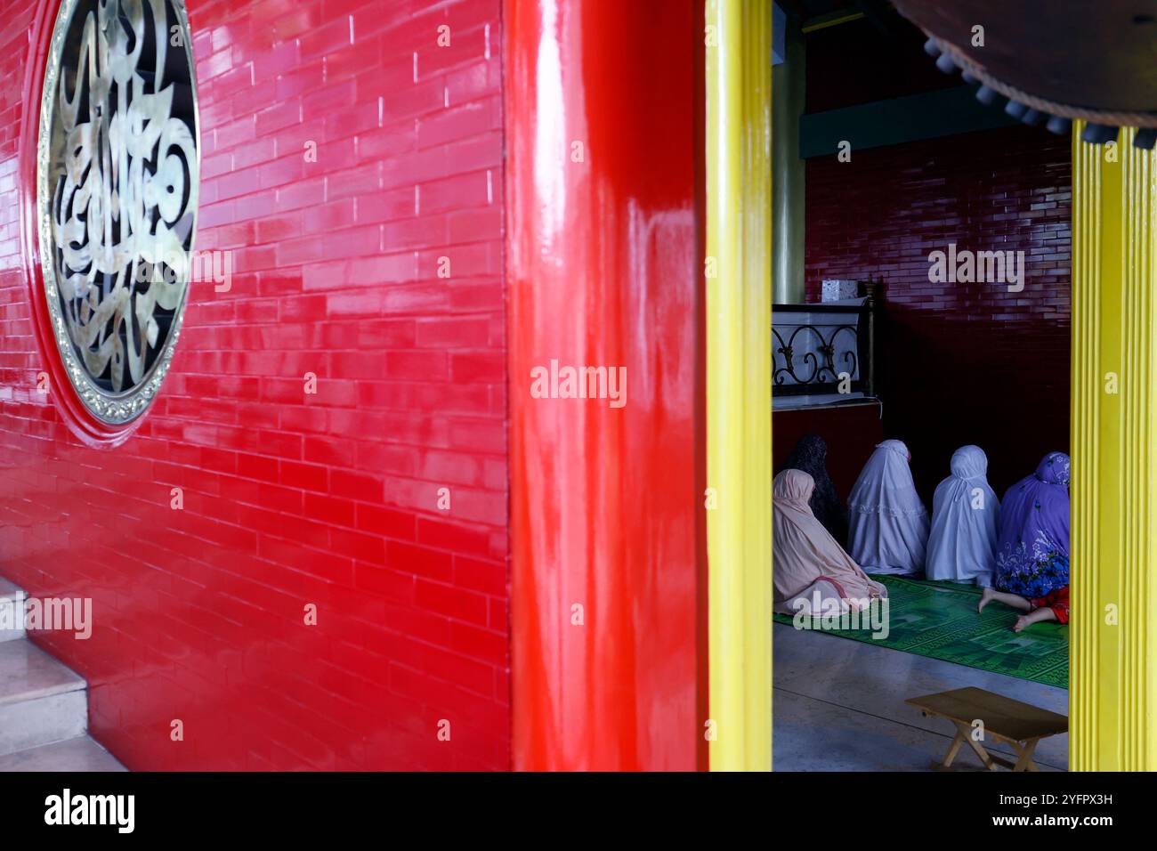 Muhammad Cheng Hoo Mosque. Muslim women praying and worship. Surabaya ...