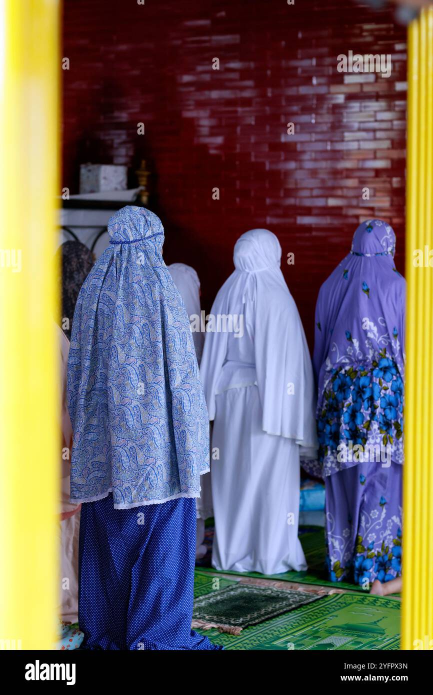 Muhammad Cheng Hoo Mosque. Muslim women praying and worship. Surabaya ...