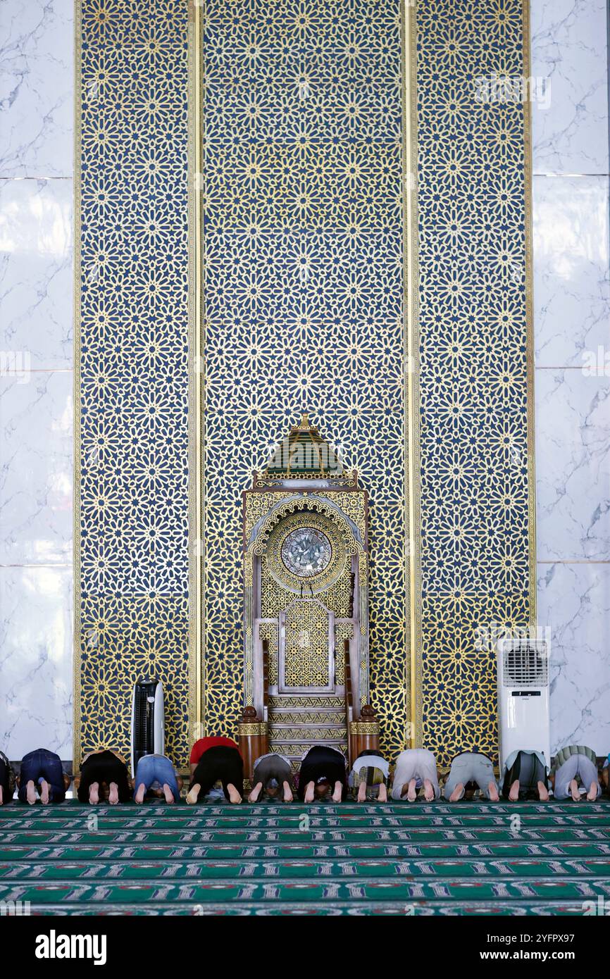 Al Akbar Surabaya National Mosque. Muslim men praying and whorship ...