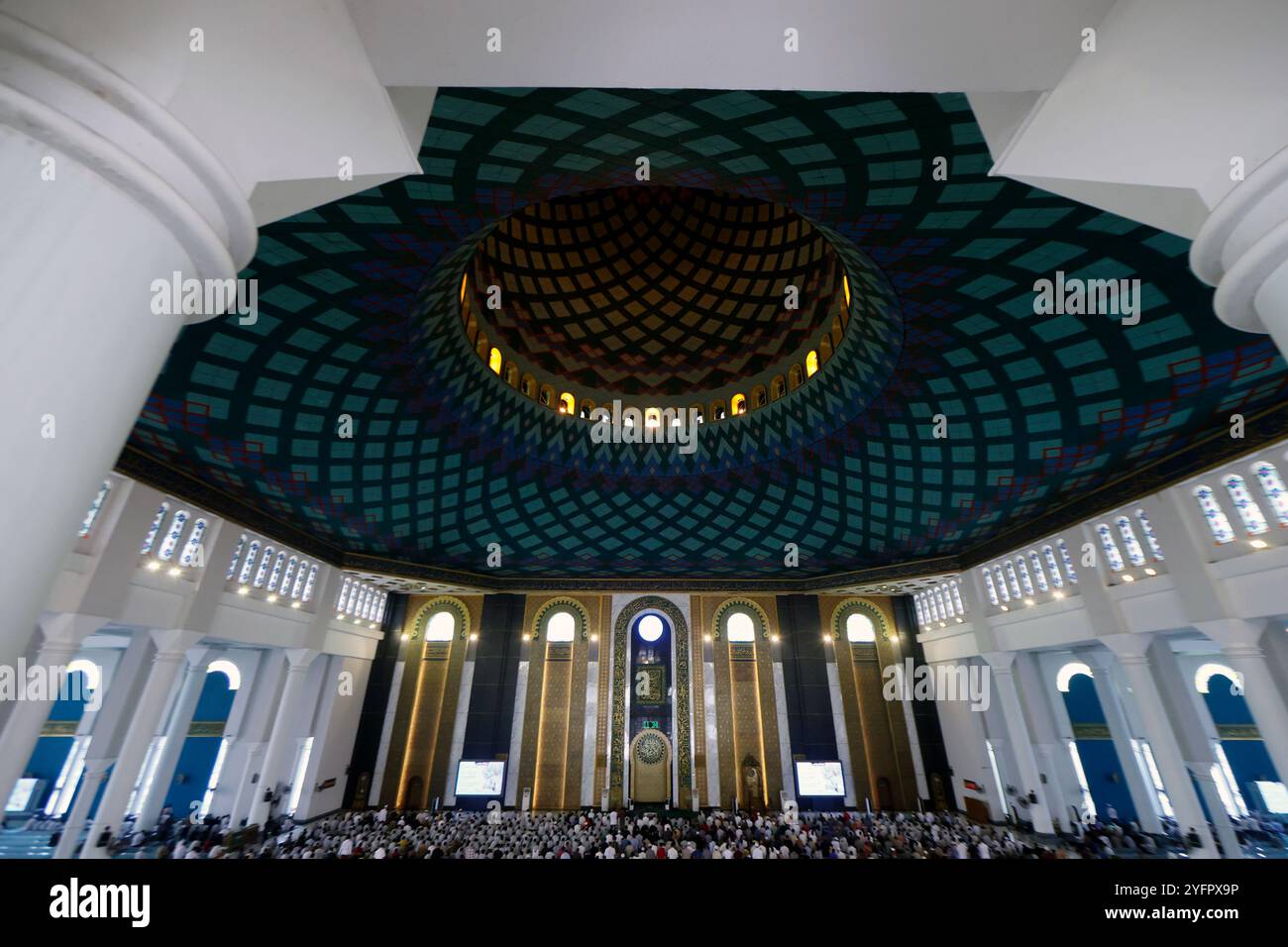 Al Akbar Surabaya National Mosque. Muslim men praying together at ...