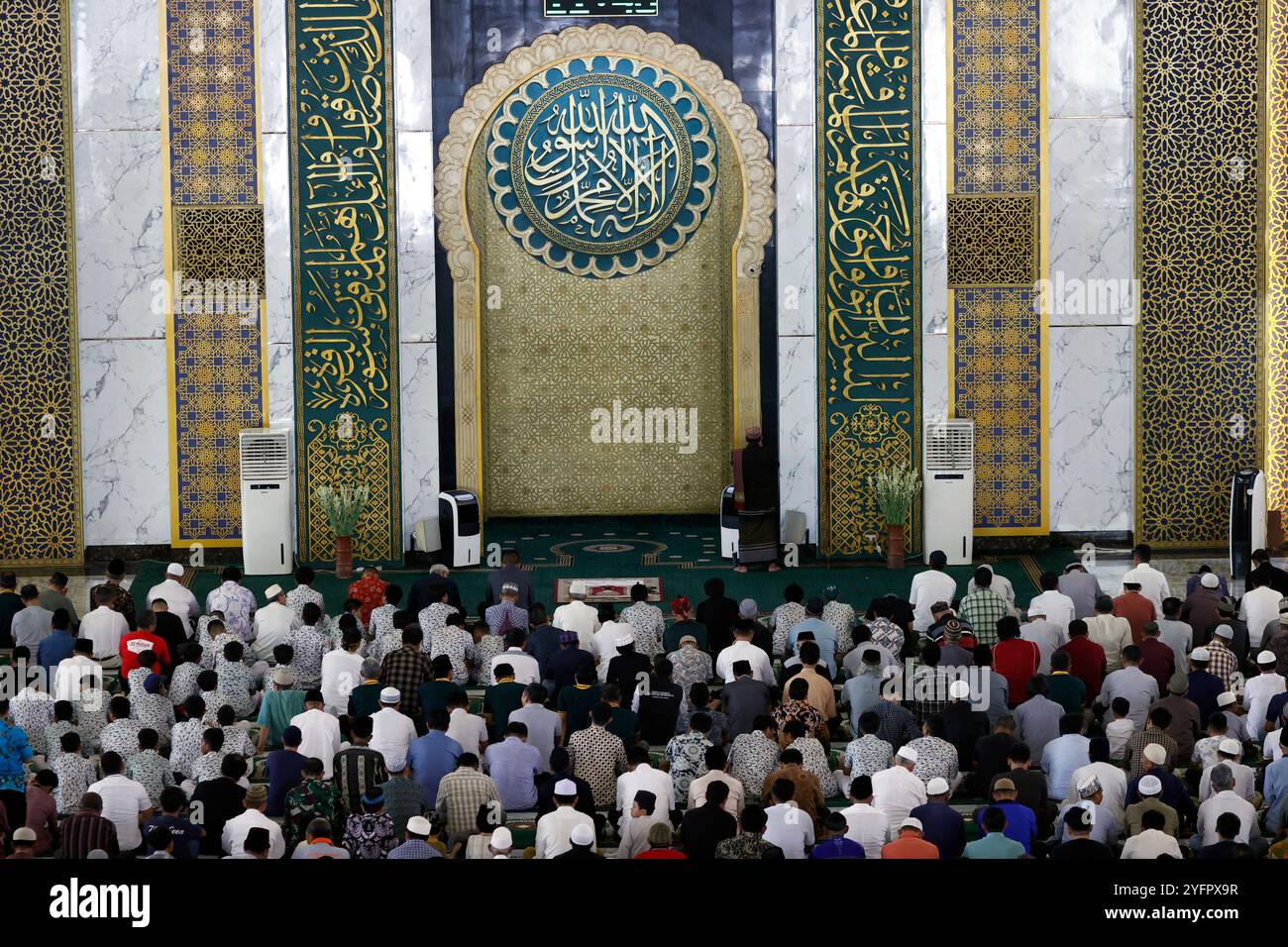 Al Akbar Surabaya National Mosque. Muslim men praying together at ...