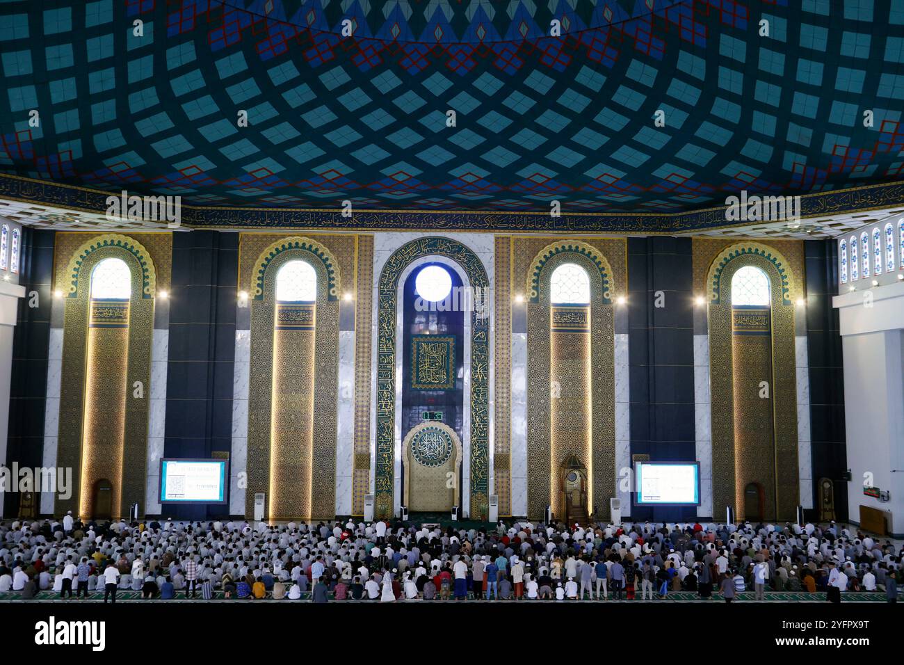 Al Akbar Surabaya National Mosque. Muslim men praying together at ...
