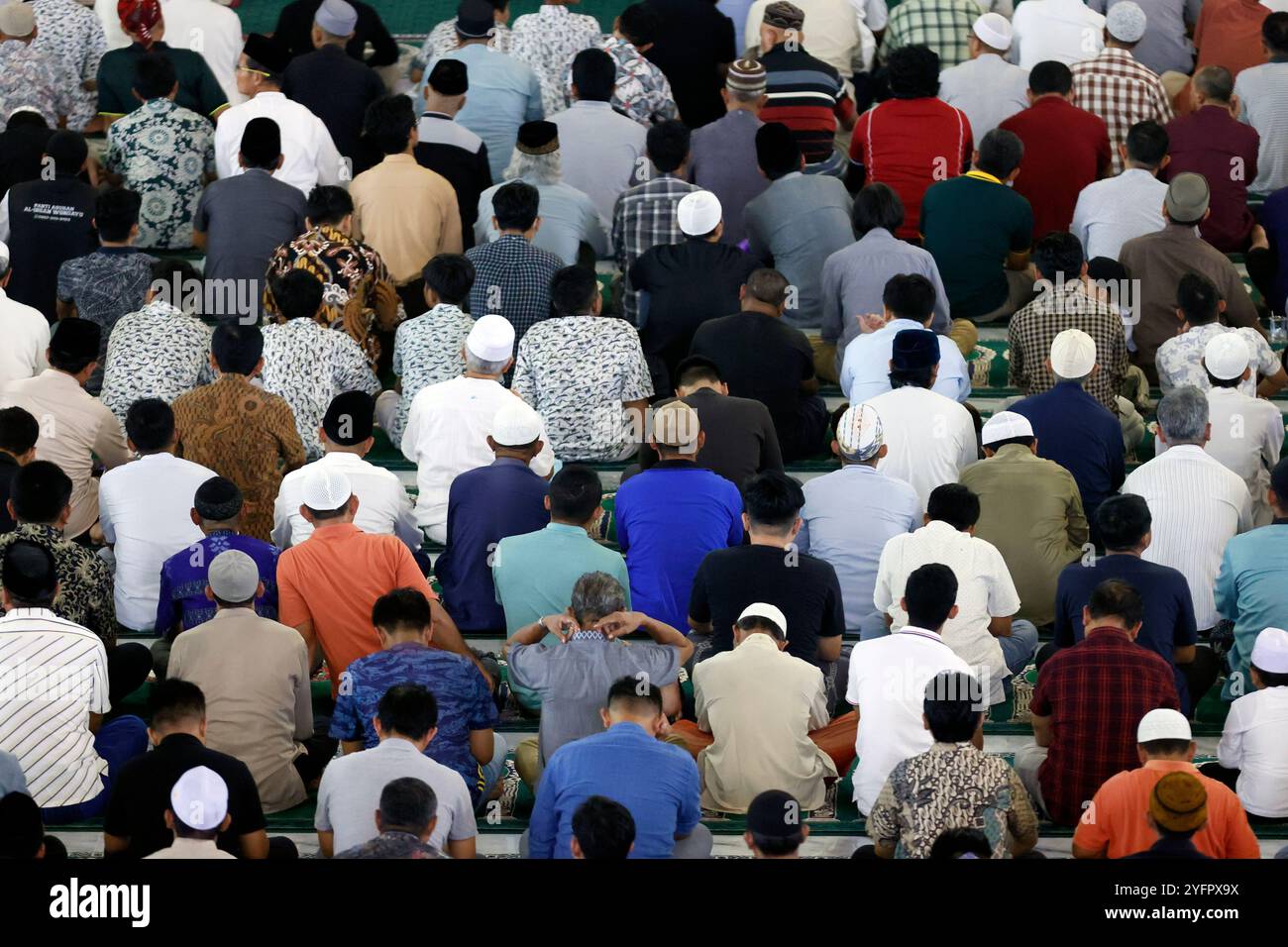 Al Akbar Surabaya National Mosque. Muslim men praying together at ...