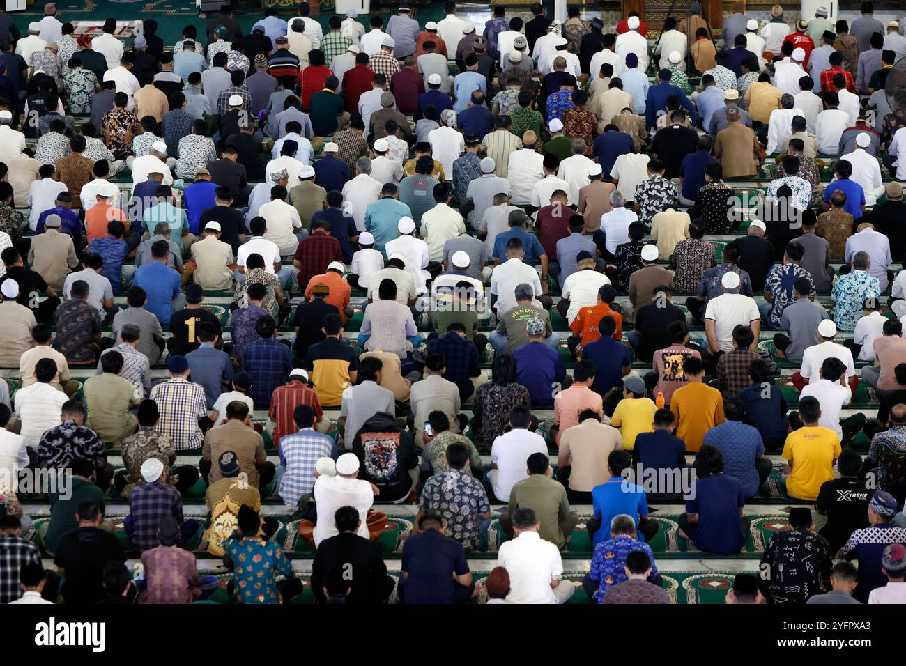 Al Akbar Surabaya National Mosque. Muslim men praying together at ...