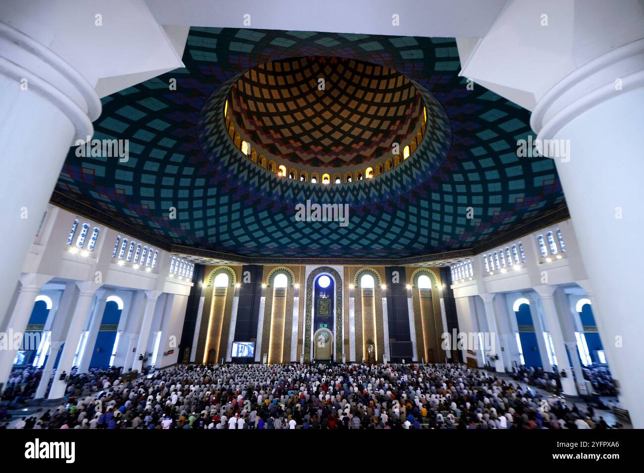 Al Akbar Surabaya National Mosque. Muslim men praying together at ...