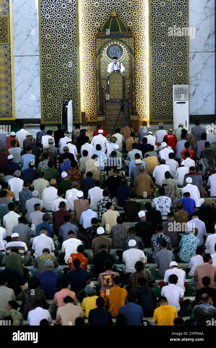 Al Akbar Surabaya National Mosque. Muslim men praying together at ...