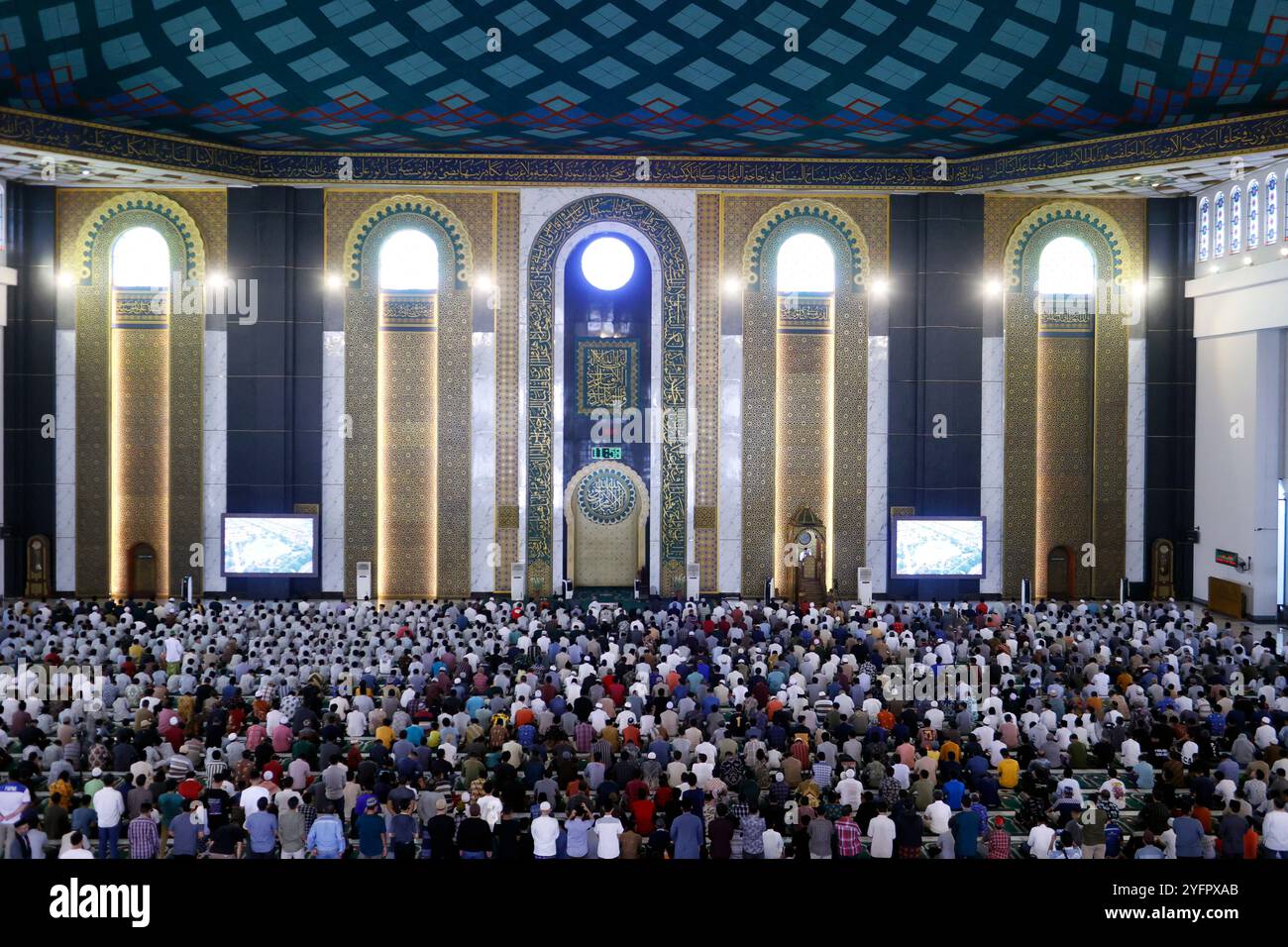 Al Akbar Surabaya National Mosque. Muslim men praying together at ...