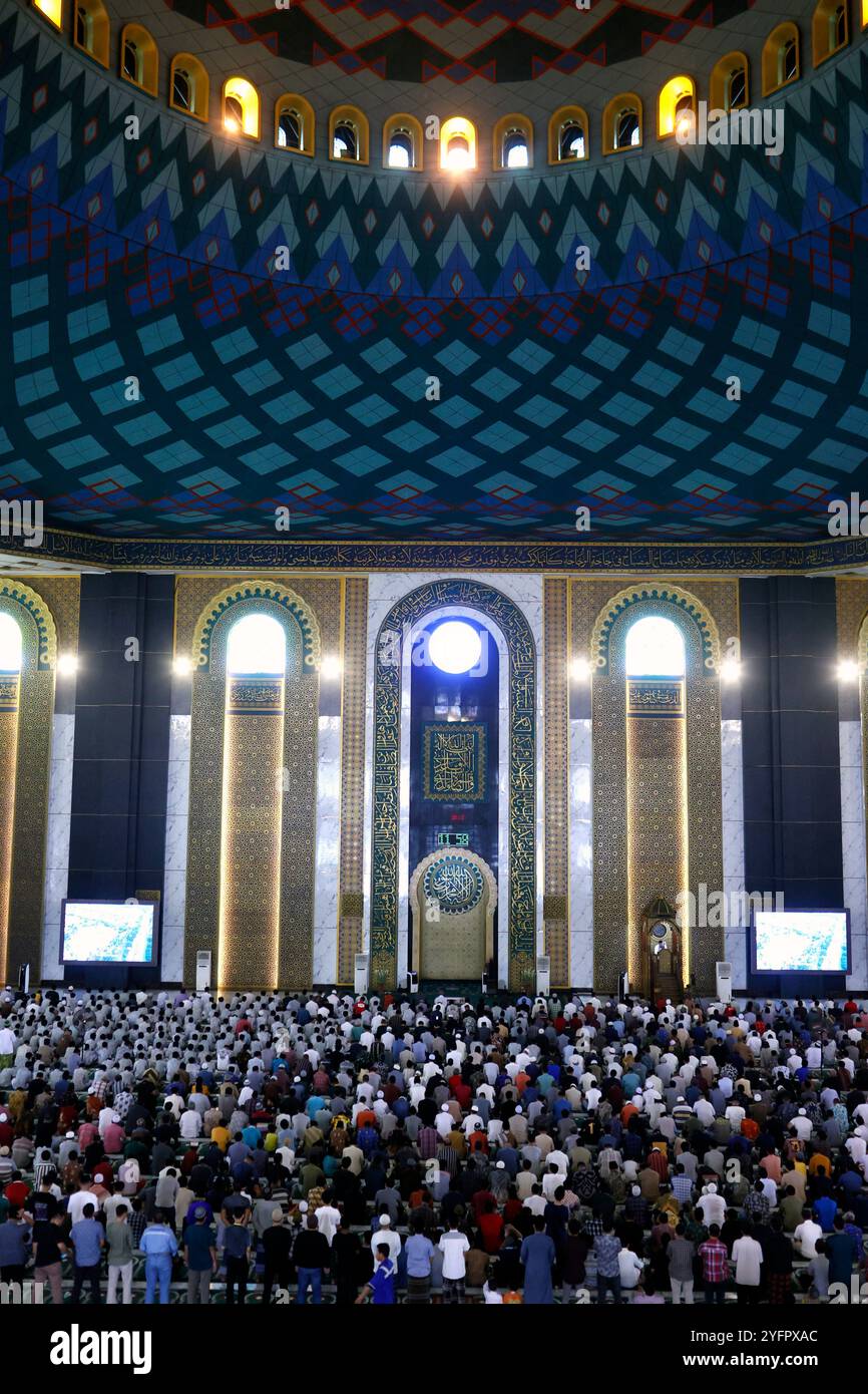 Al Akbar Surabaya National Mosque. Muslim men praying together at ...