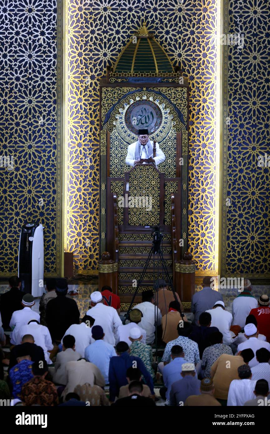 Al Akbar Surabaya National Mosque. Muslim men praying together at ...