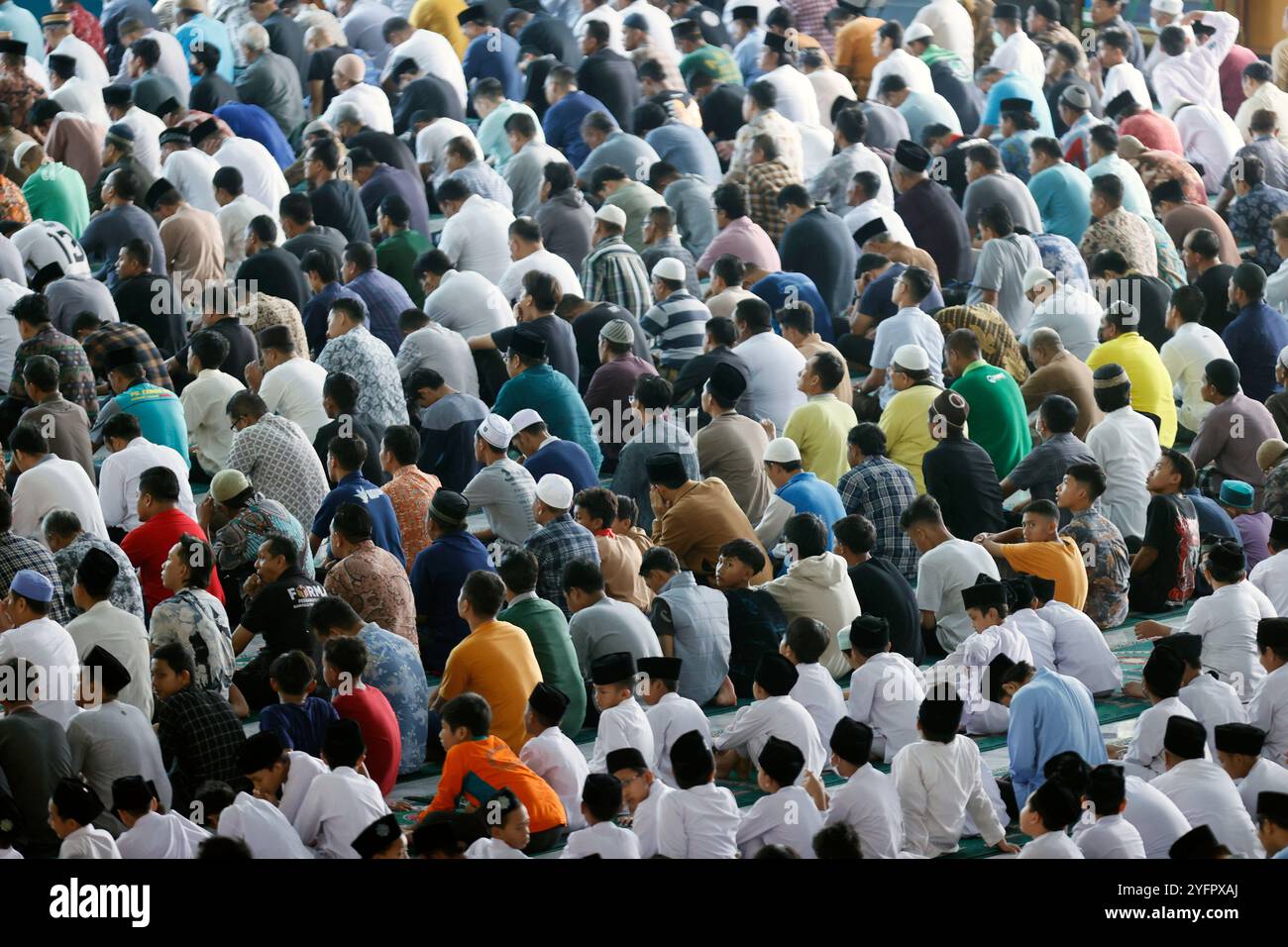 Al Akbar Surabaya National Mosque. Muslim men praying together at ...