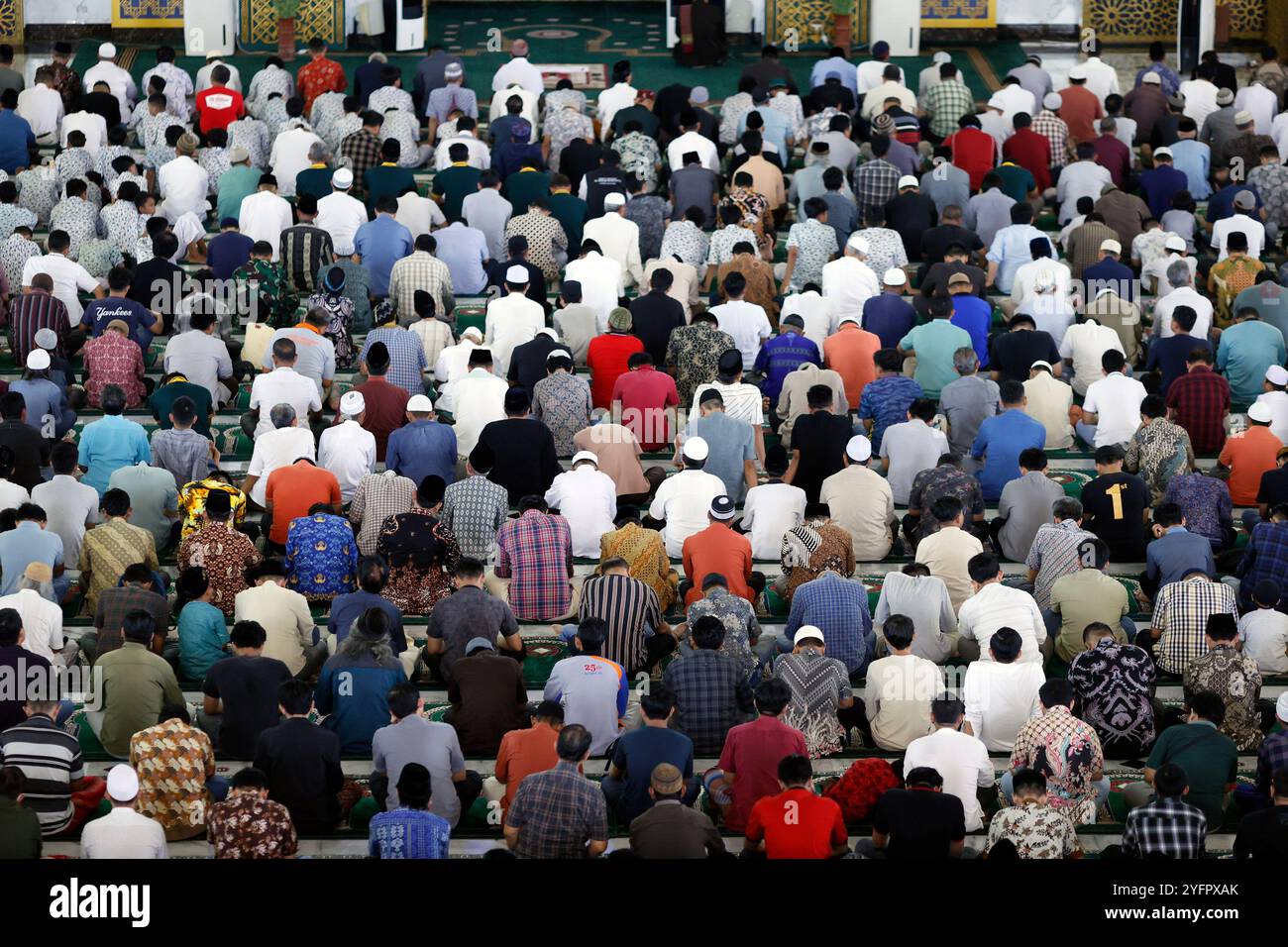 Al Akbar Surabaya National Mosque. Muslim men praying together at ...