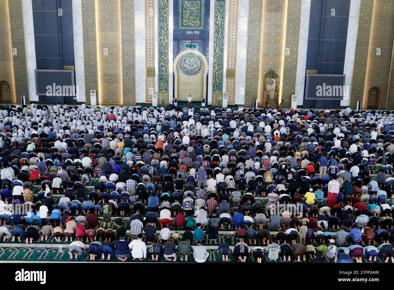 Al Akbar Surabaya National Mosque. Muslim men praying together at ...