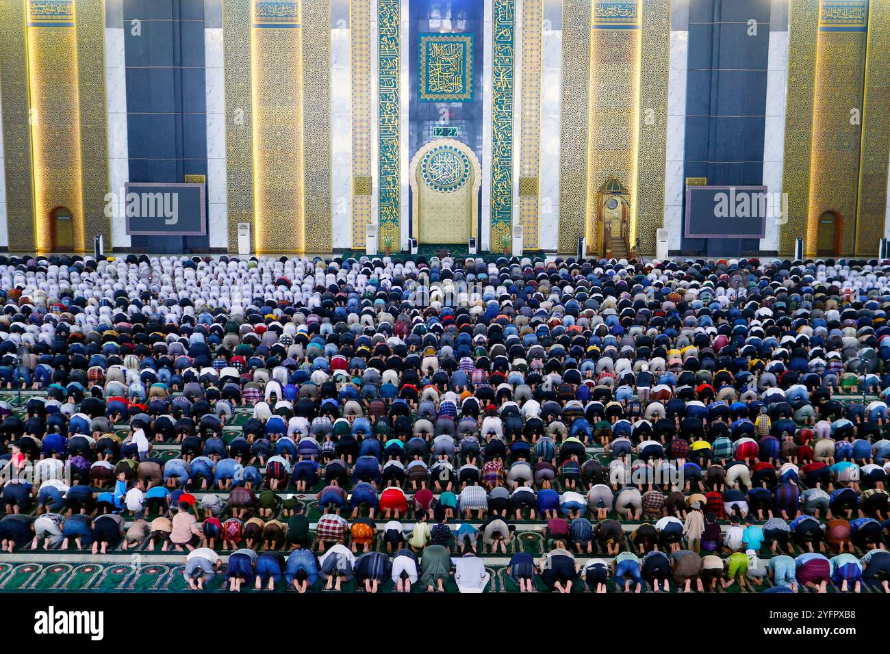 Al Akbar Surabaya National Mosque. Muslim men praying together at ...