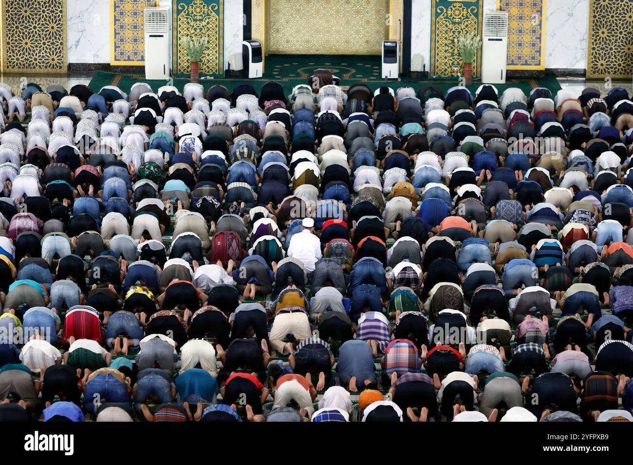 Al Akbar Surabaya National Mosque. Muslim men praying together at ...
