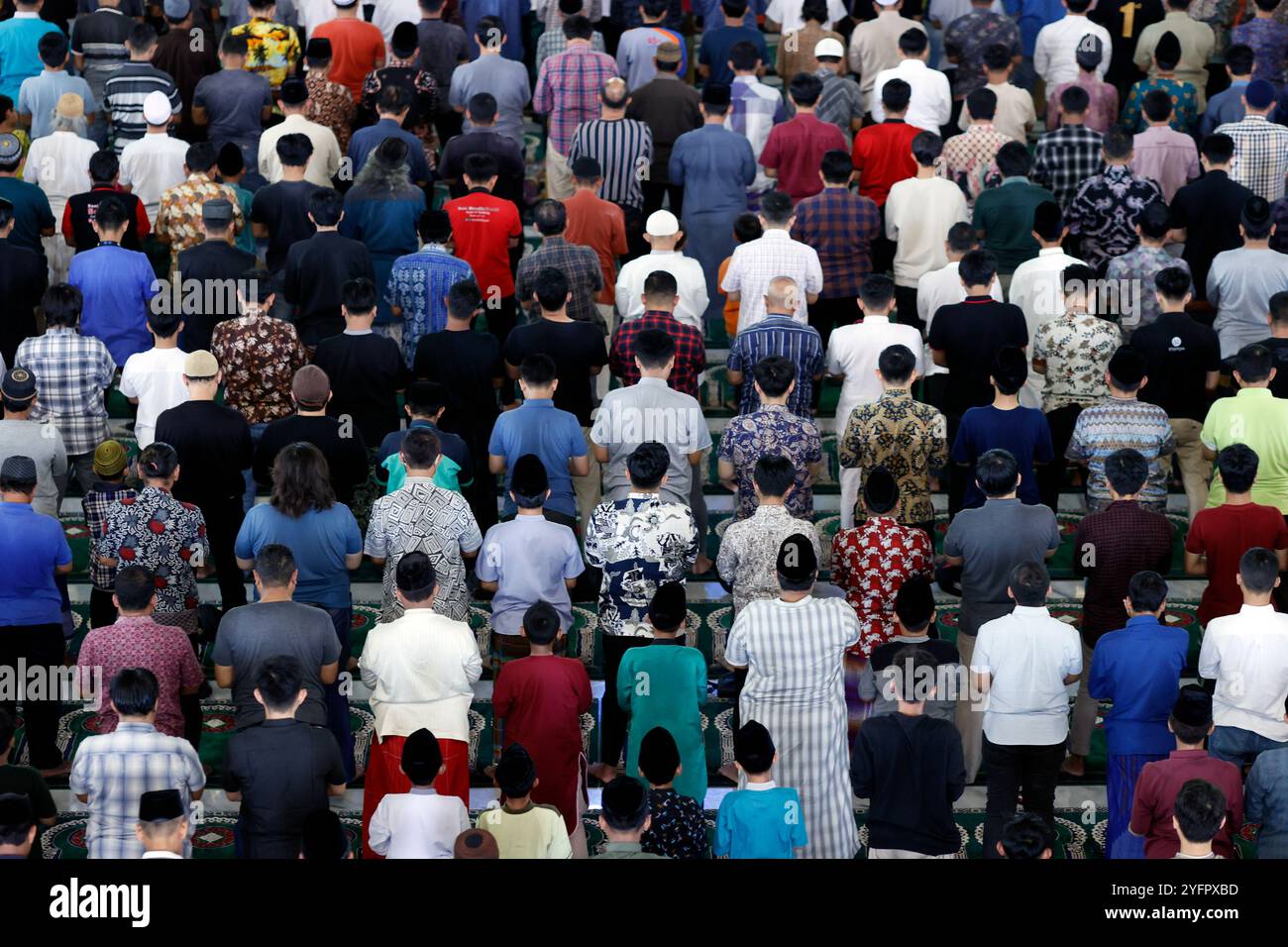 Al Akbar Surabaya National Mosque. Muslim men praying together at ...