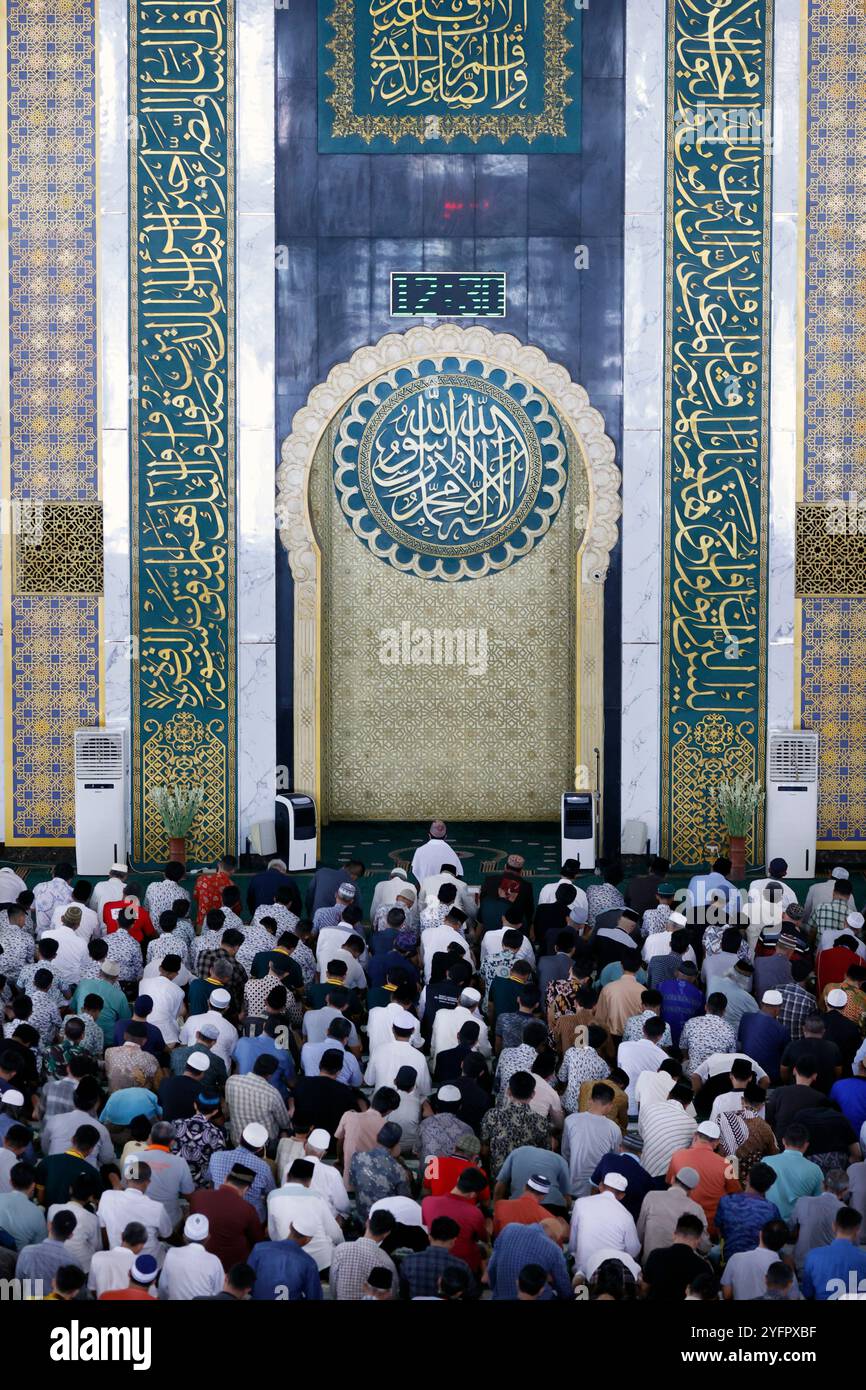 Al Akbar Surabaya National Mosque. Muslim men praying together at ...