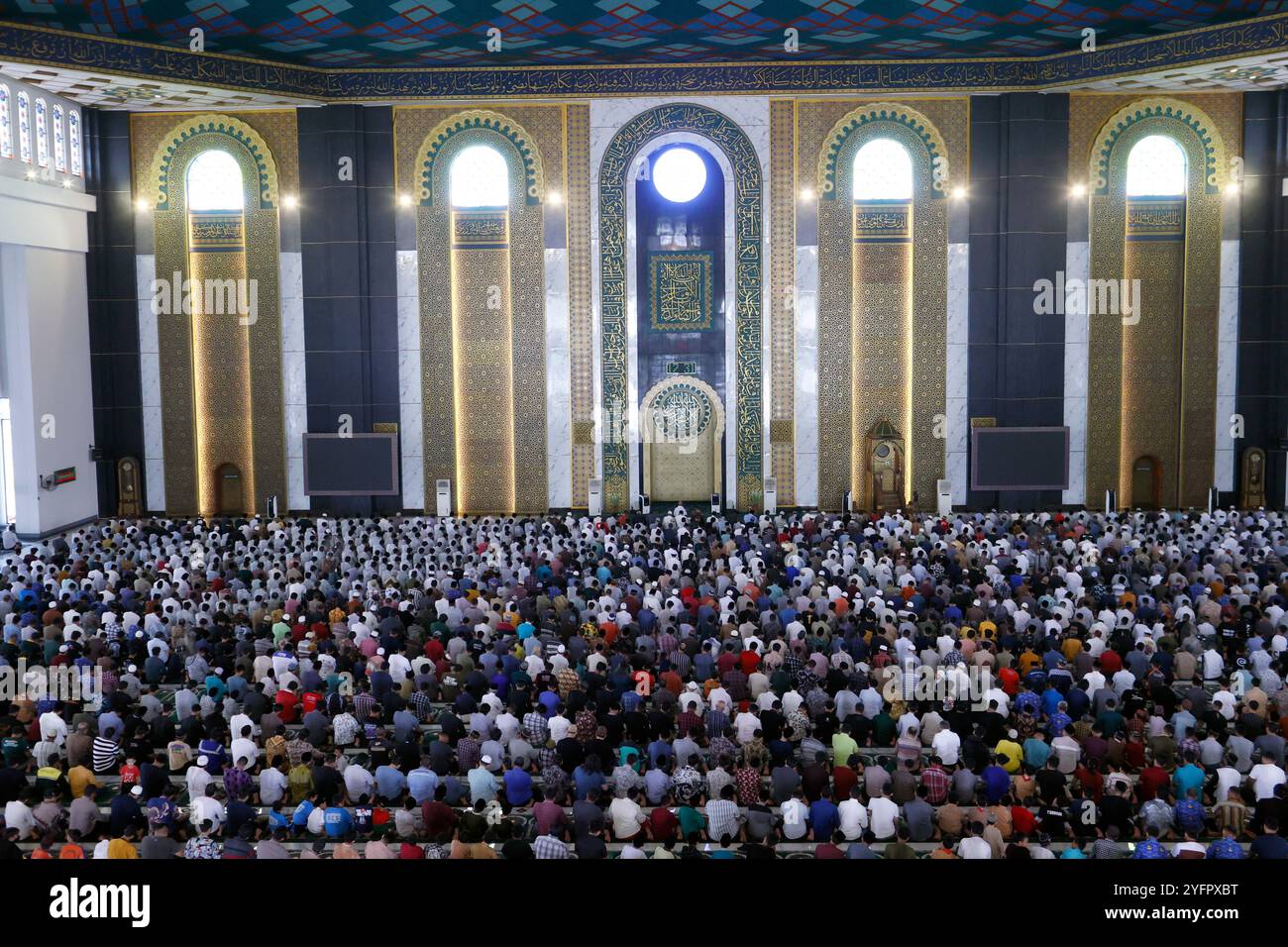 Al Akbar Surabaya National Mosque. Muslim men praying together at ...