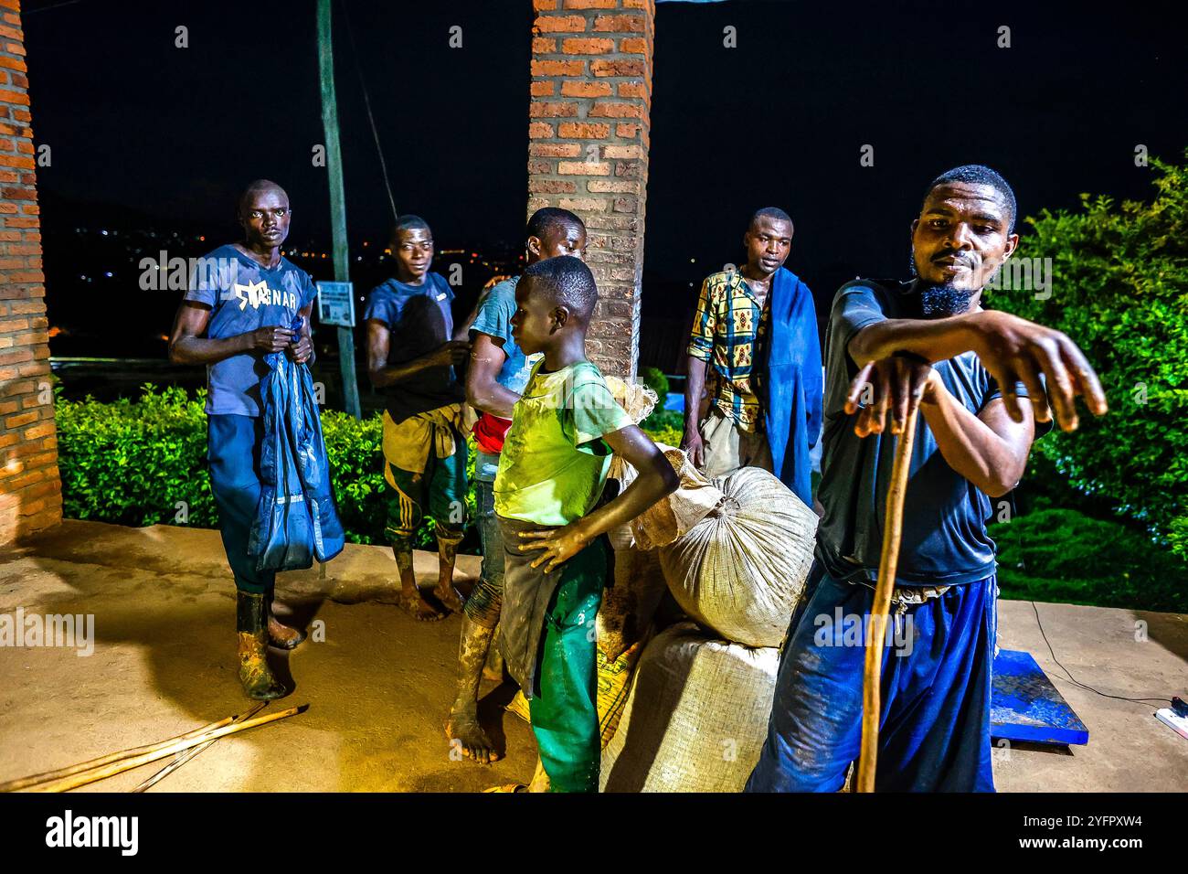Growers bringing coffee cherries to a coffee washing station, Rutsiro ...