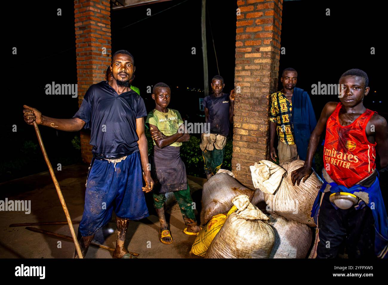 Growers bringing coffee cherries to a coffee washing station, Rutsiro ...