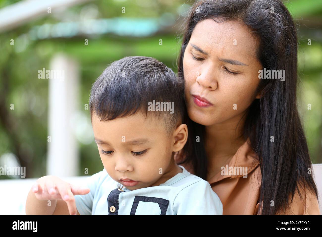 A serene moment between a mother and her child reflects deep emotional ...