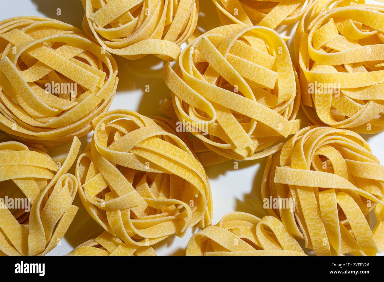 Uncooked Egg-Based Fettuccine Pasta: A Culinary Canvas of Ribbon-Shaped ...