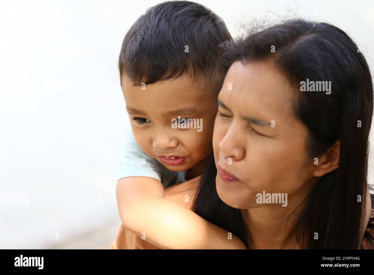 A joyful moment captured between a mother and her child, showcasing ...