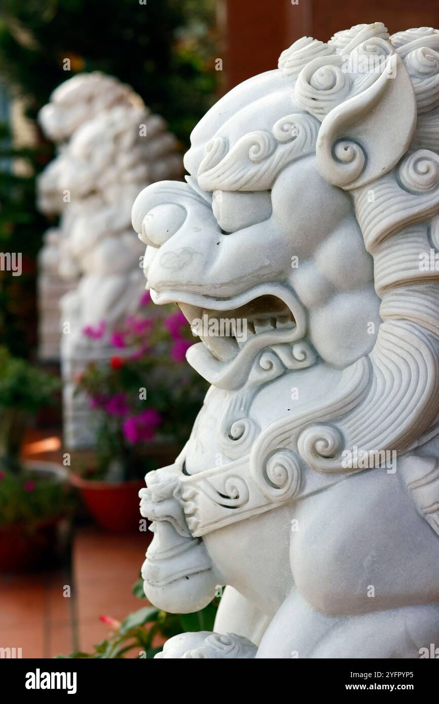 Guardian. Chinese lion statue represent Yang force, male, positive ...
