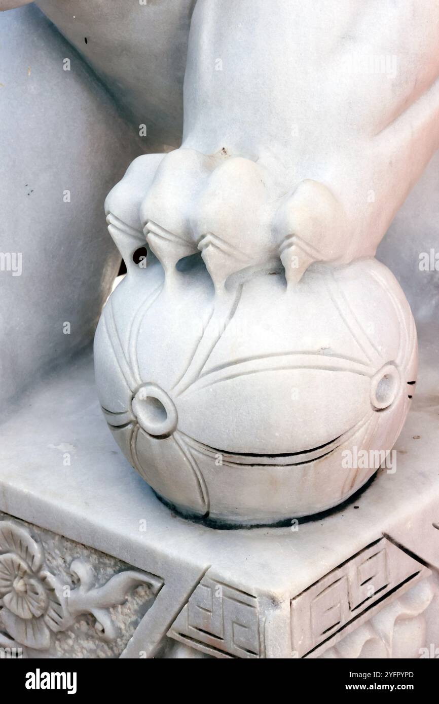 Guardian. Chinese lion statue represent Yang force, male, positive ...