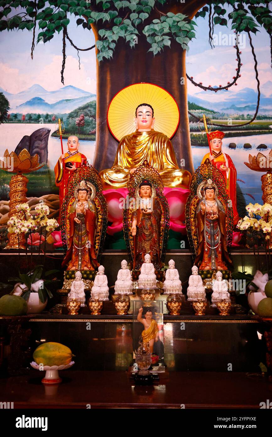 Long Quang Pagoda. Main altar with Buddha statues. An Giang Province ...