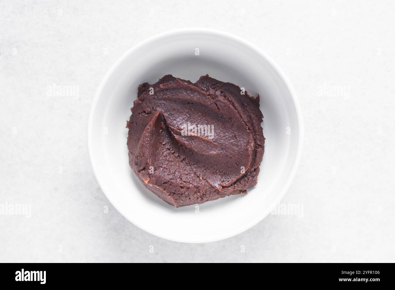 Overhead view of red bean paste in a white bowl, top view of sweet ...