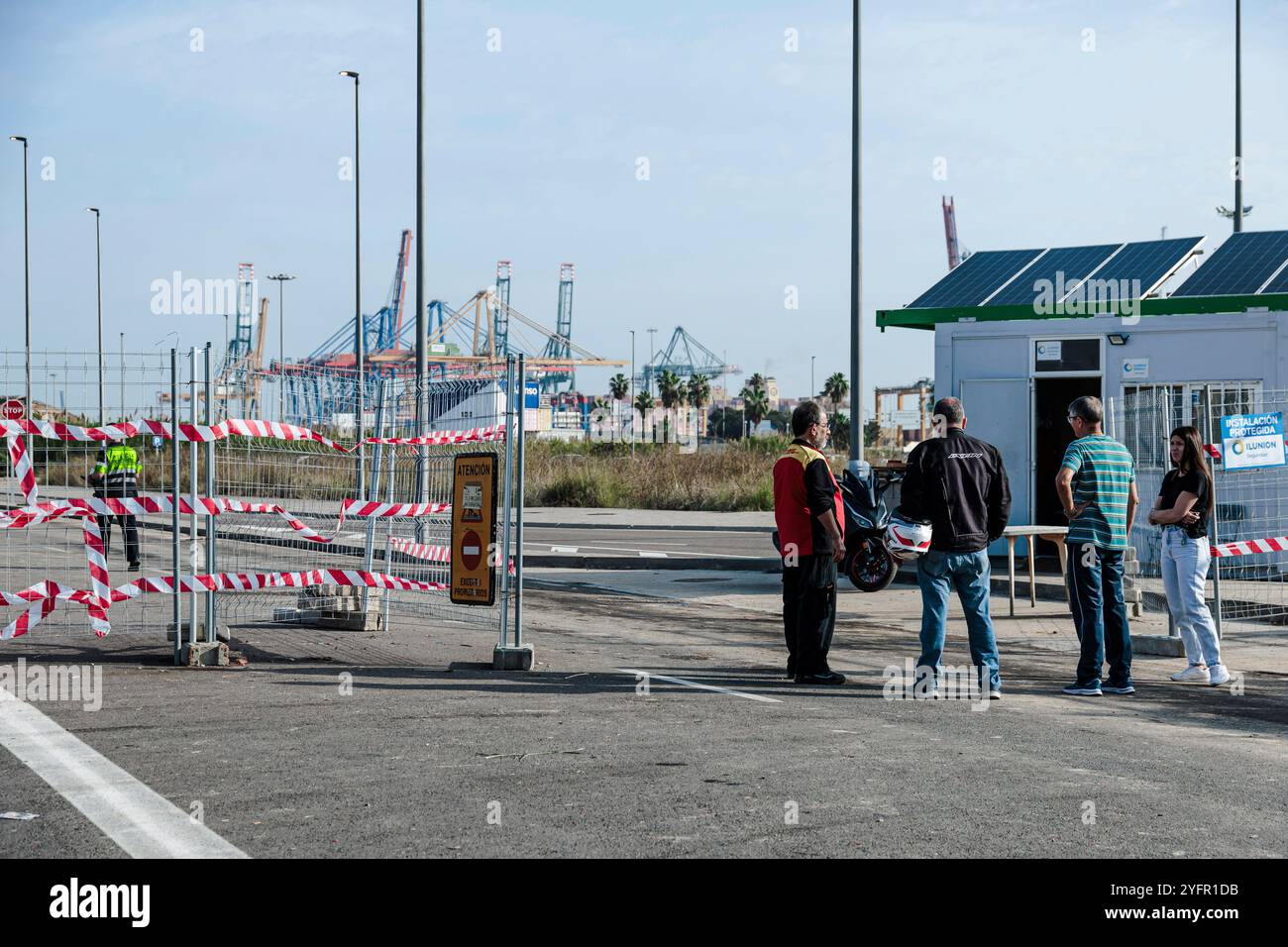 Several people at the entrance of the ZAL of the Port of Valencia where ...
